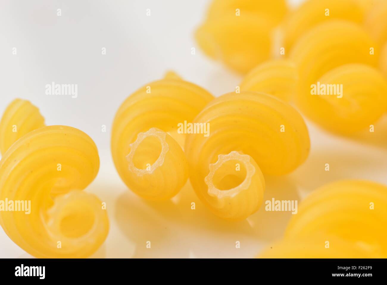 cooking raw yellow macaroni (pasta Stock Photo - Alamy
