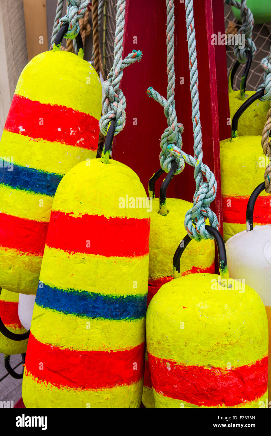 Colorful lobster trap bouys on display at Pointe-du-Chene Wharf near ...