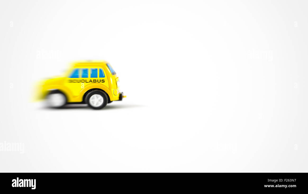 Caricature of a school bus. Little toy caro f a Italian school bus ...