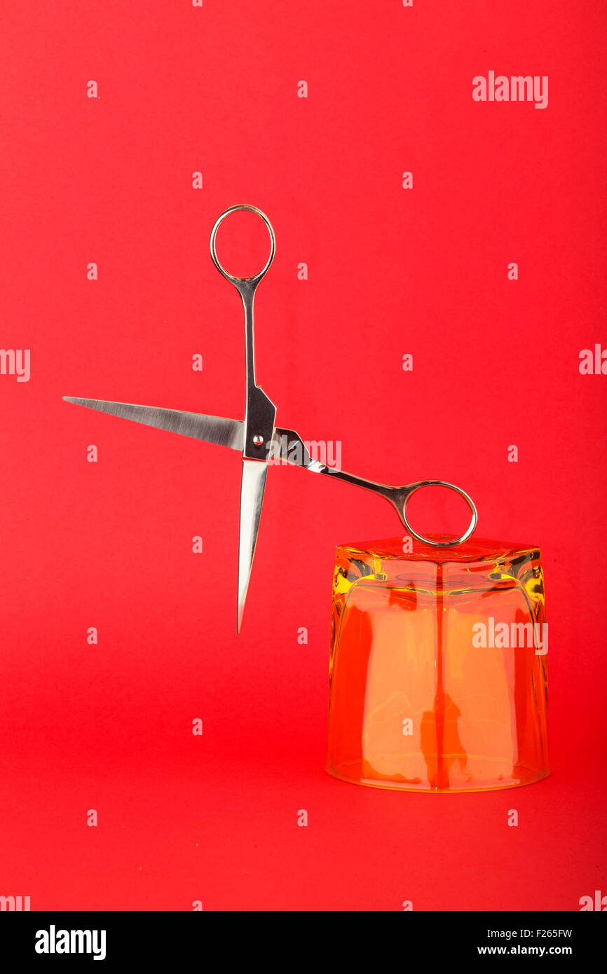 scissors on glass Stock Photo - Alamy