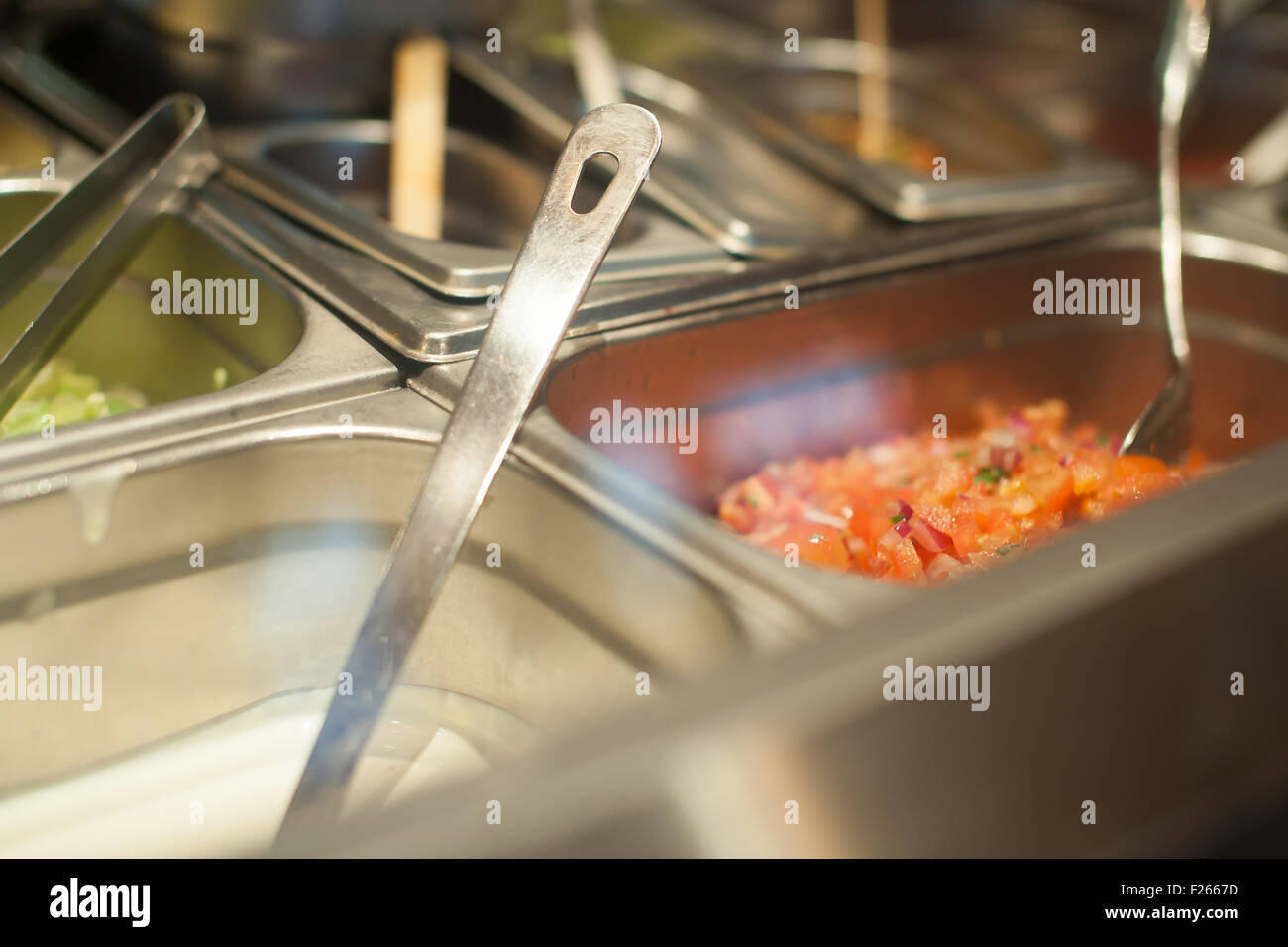 Working kitchen full of fresh ingredients Stock Photo - Alamy