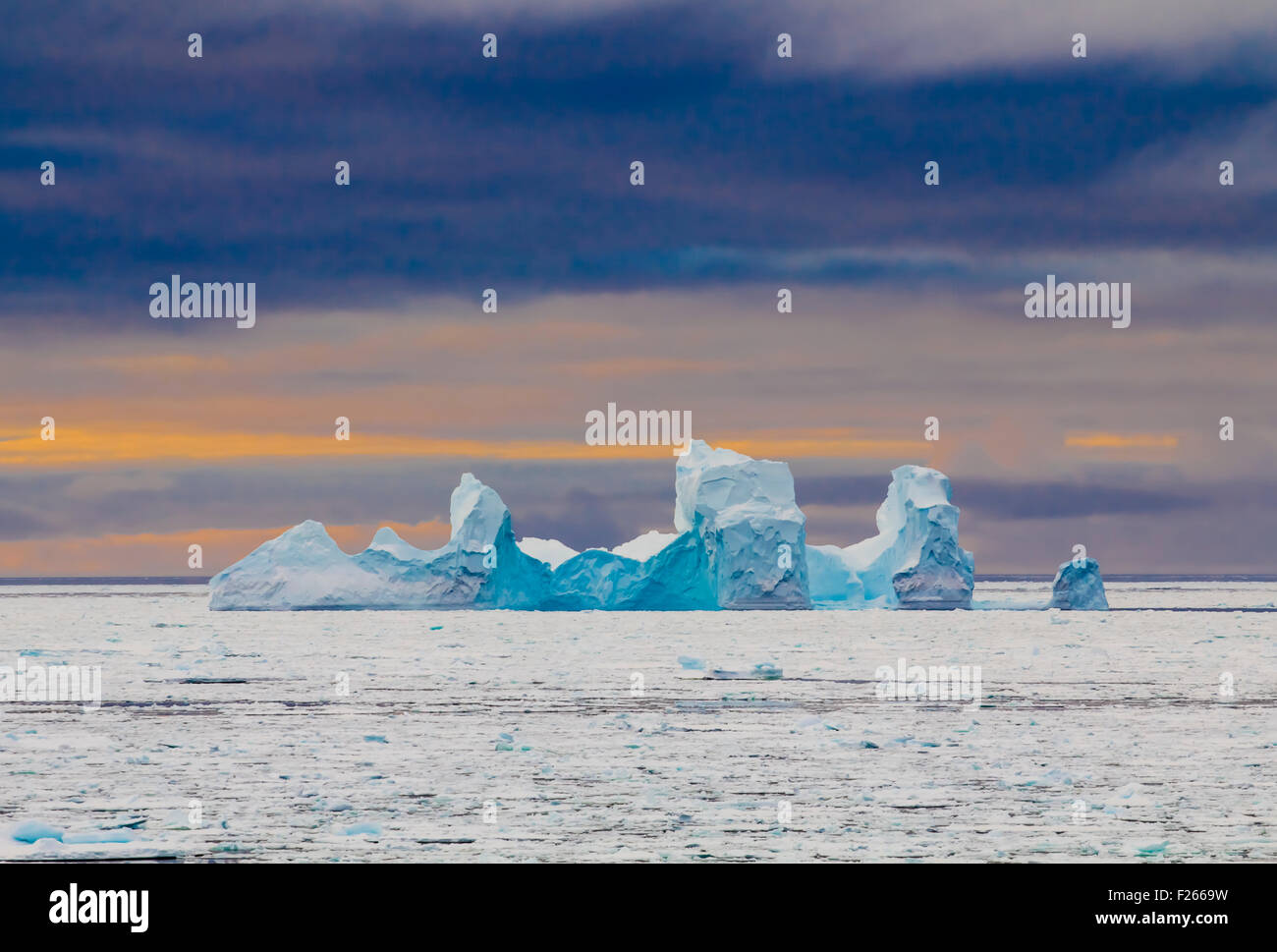 Blue colored iceberg during a stunning sunrise in Antarctica (Weddell ...