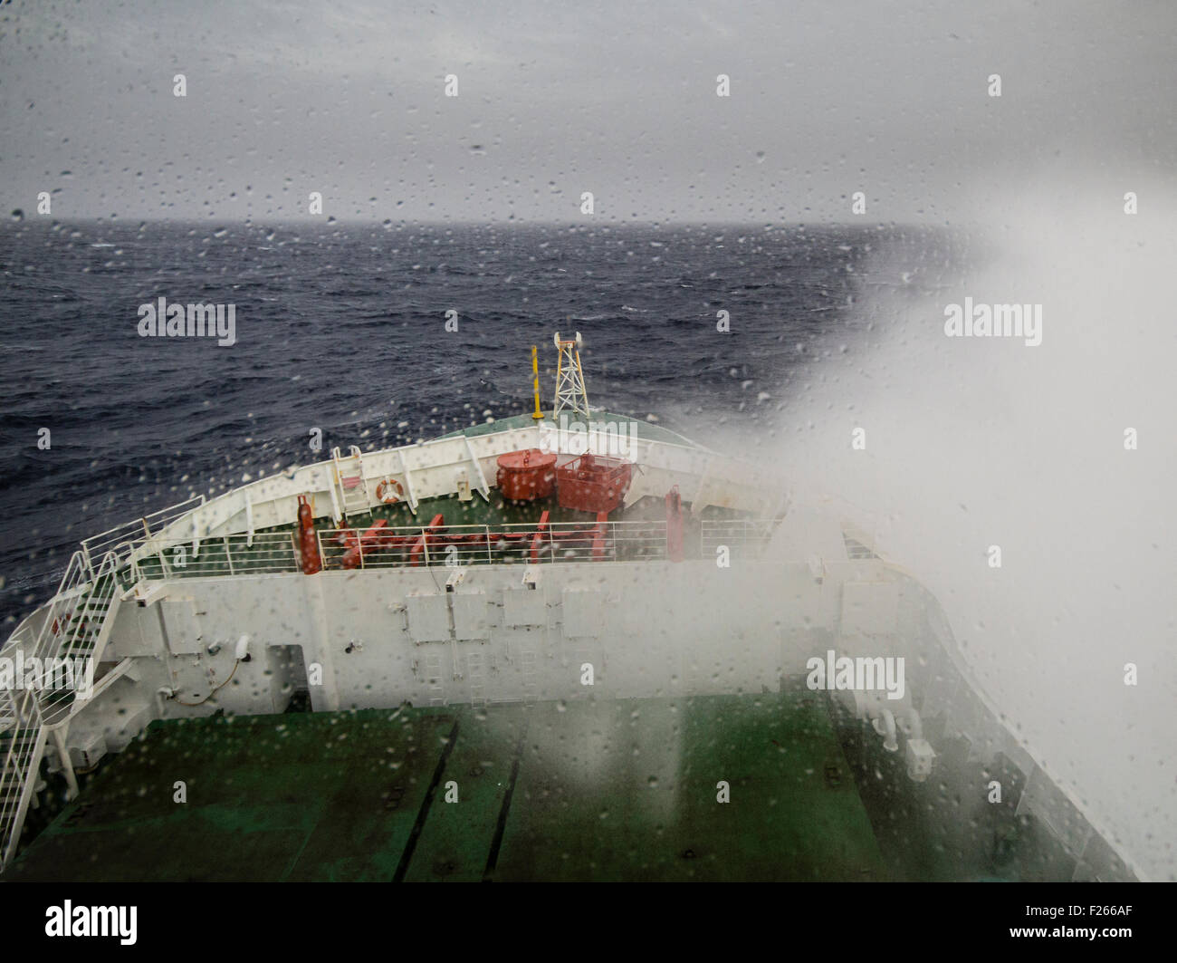 Ship cruising in heavy seas and rainy weather Stock Photo - Alamy