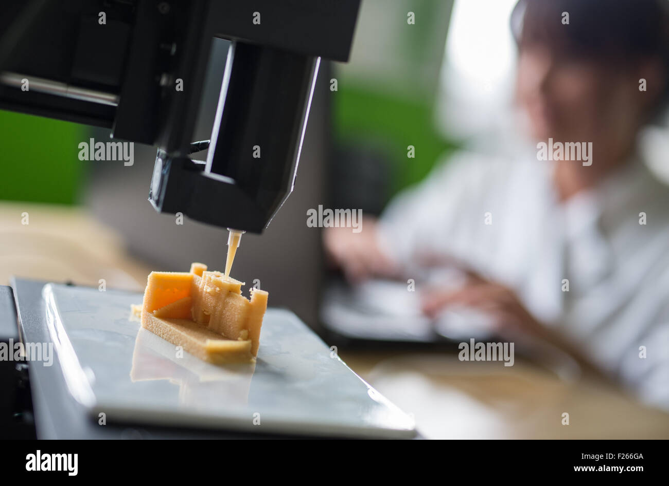 A 3D food printer prints a marzipan model of Neuschwanstein Castle in ...