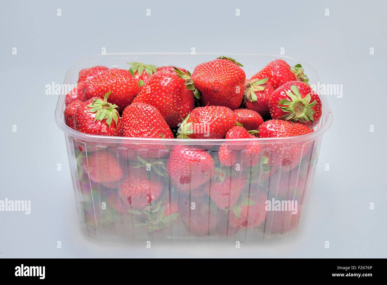 red strawberries in transparent box at supermarket Stock Photo - Alamy