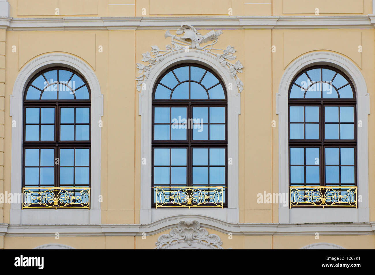 Three beautifully ornated old windows of an reconstructed house Stock ...