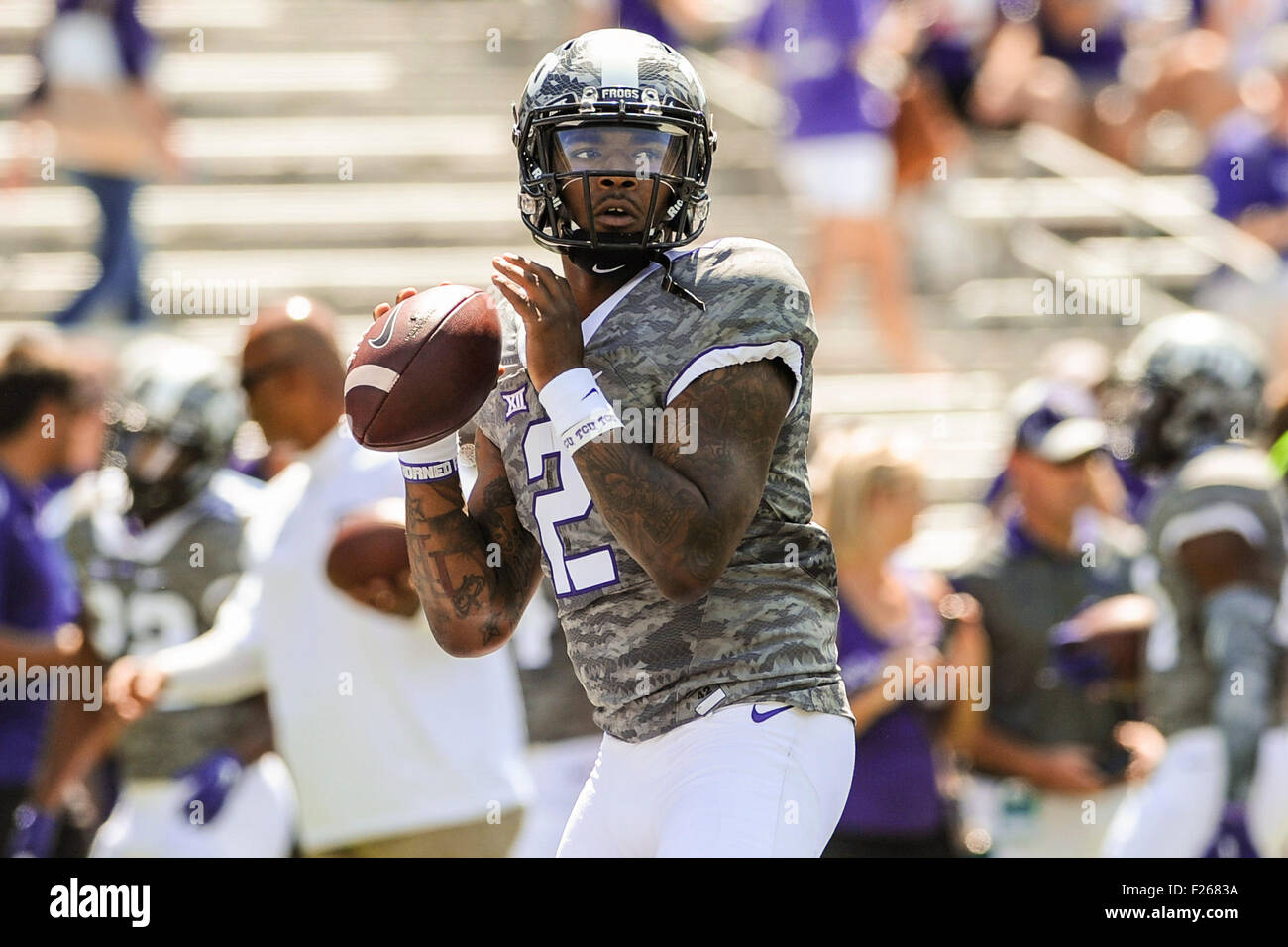 TCU quarterback Trevone Boykin (2) looks to throw a pass during pregame ...