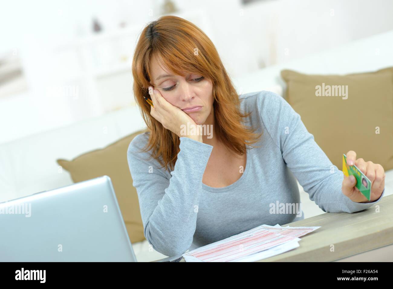 Woman going over her finances Stock Photo - Alamy