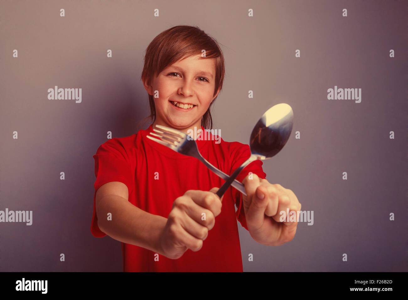 Boy with fork hi-res stock photography and images - Alamy