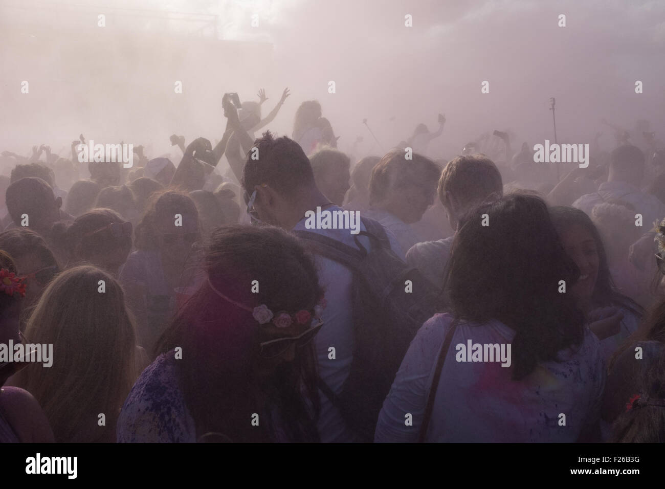 London, UK. 13th Sep, 2015. Revellers at the Holi Festival Of Colours ...