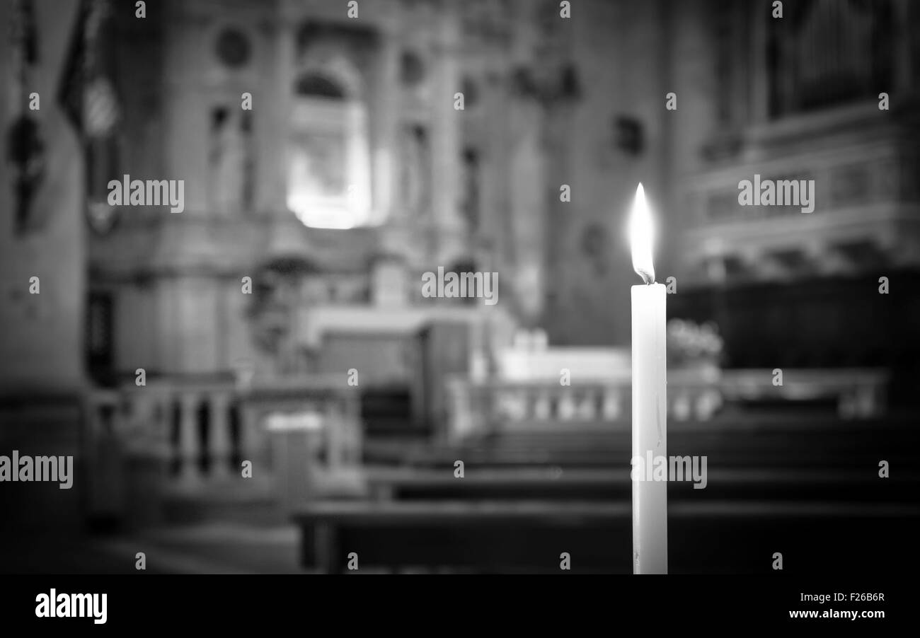 Black and white candle light and altar in the background Stock Photo ...