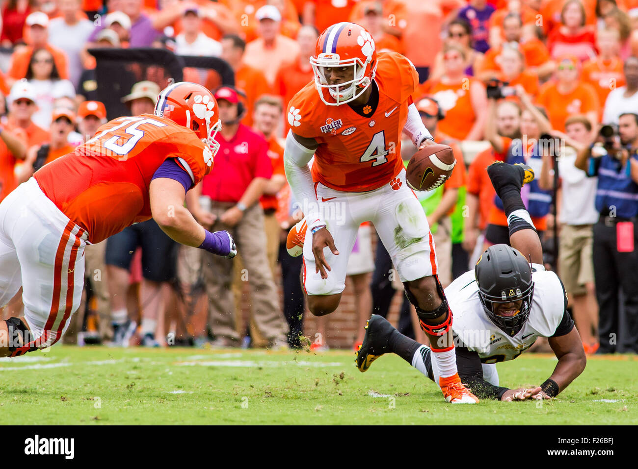 Clemson Tigers quarterback Deshaun Watson (4) escapes the pocket and ...