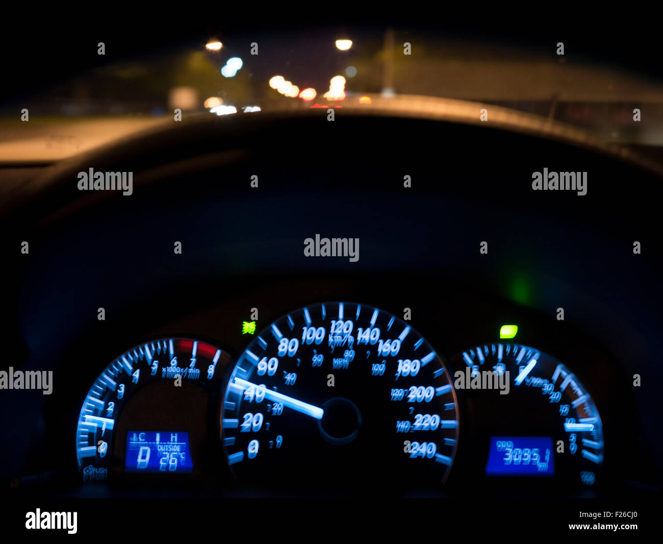 Blurred vision of a drunk driver during night drive in a city Stock ...