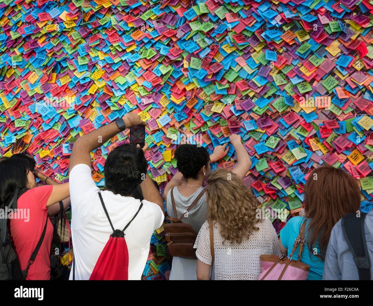 Wall of wish list stickers Stock Photo - Alamy