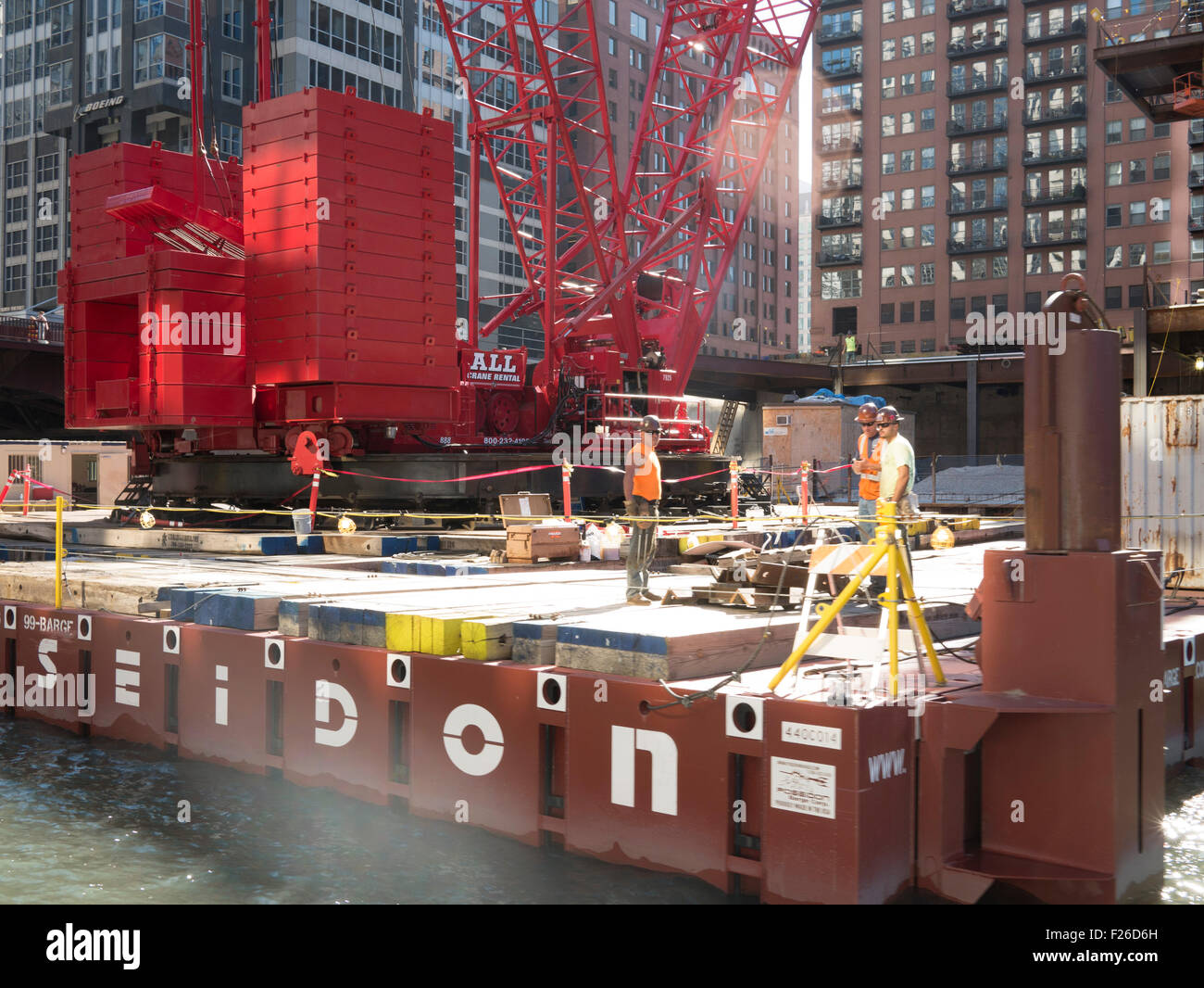 Construction site on Chicago river. Men at work Stock Photo - Alamy