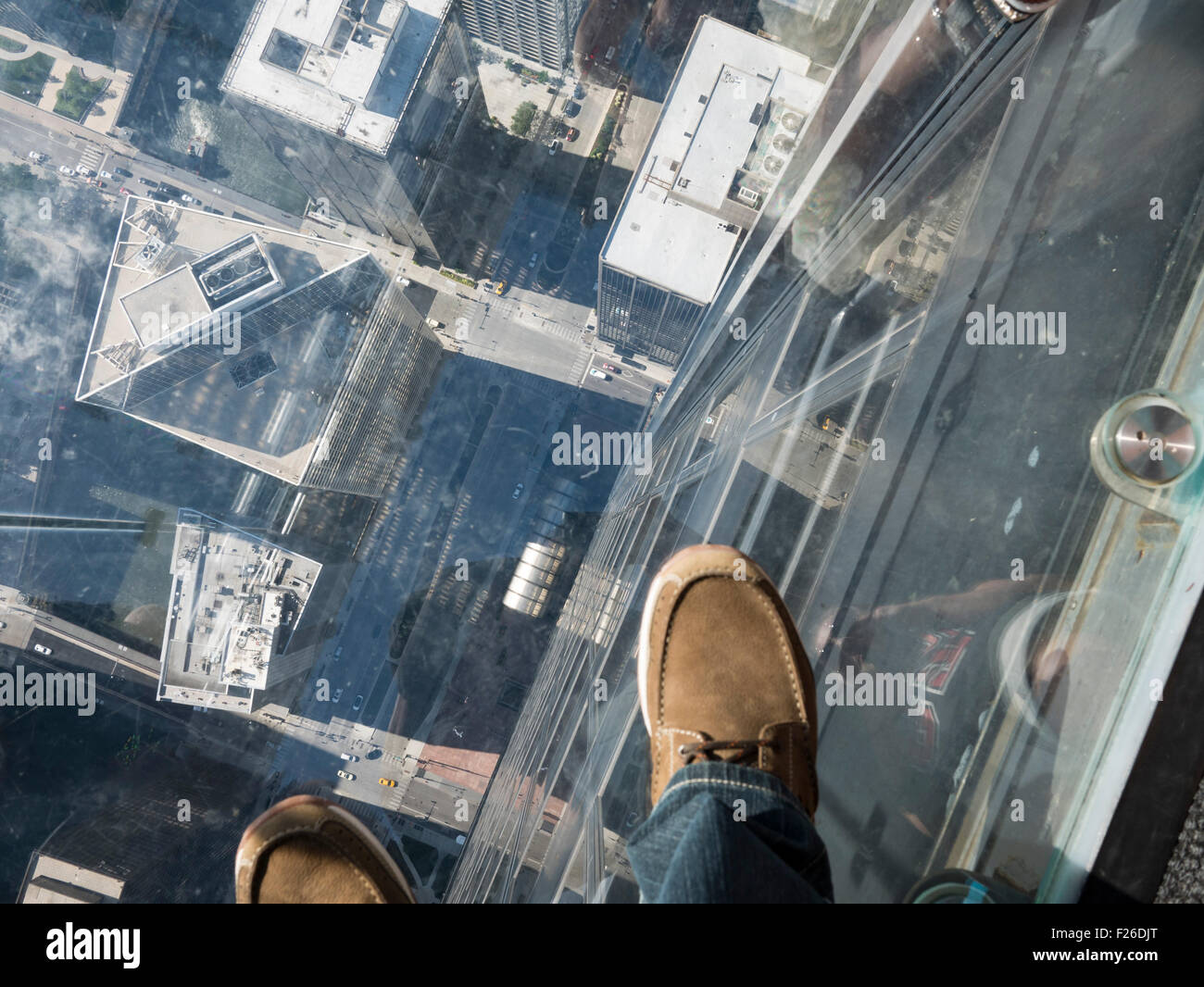 Tourists enjoying the aerial view of Chicago from Willis Tower Skyview ...