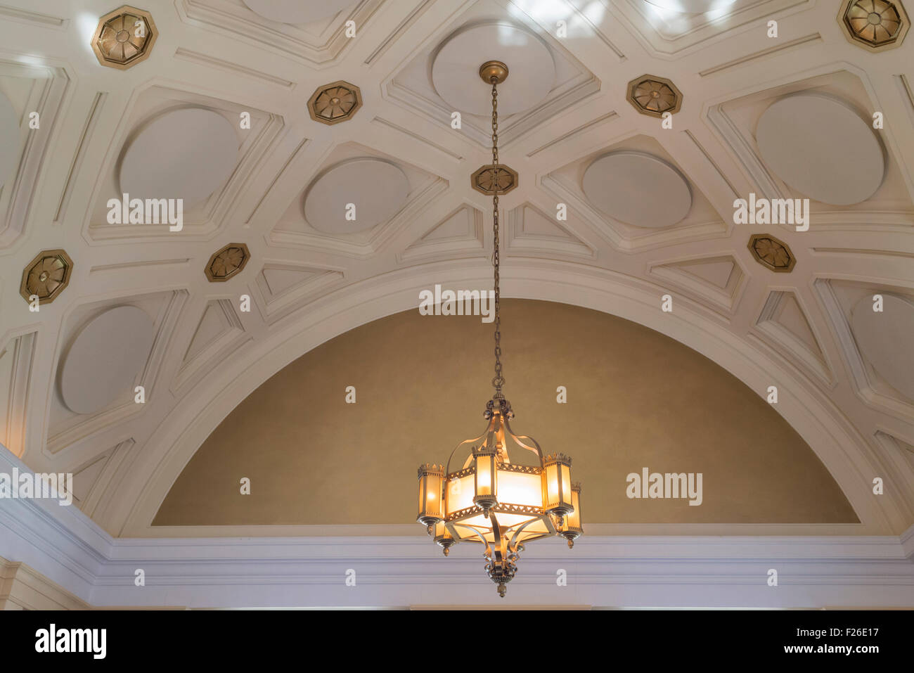 Abstract view of Chandelier hanging from a decorative ceiling Stock ...