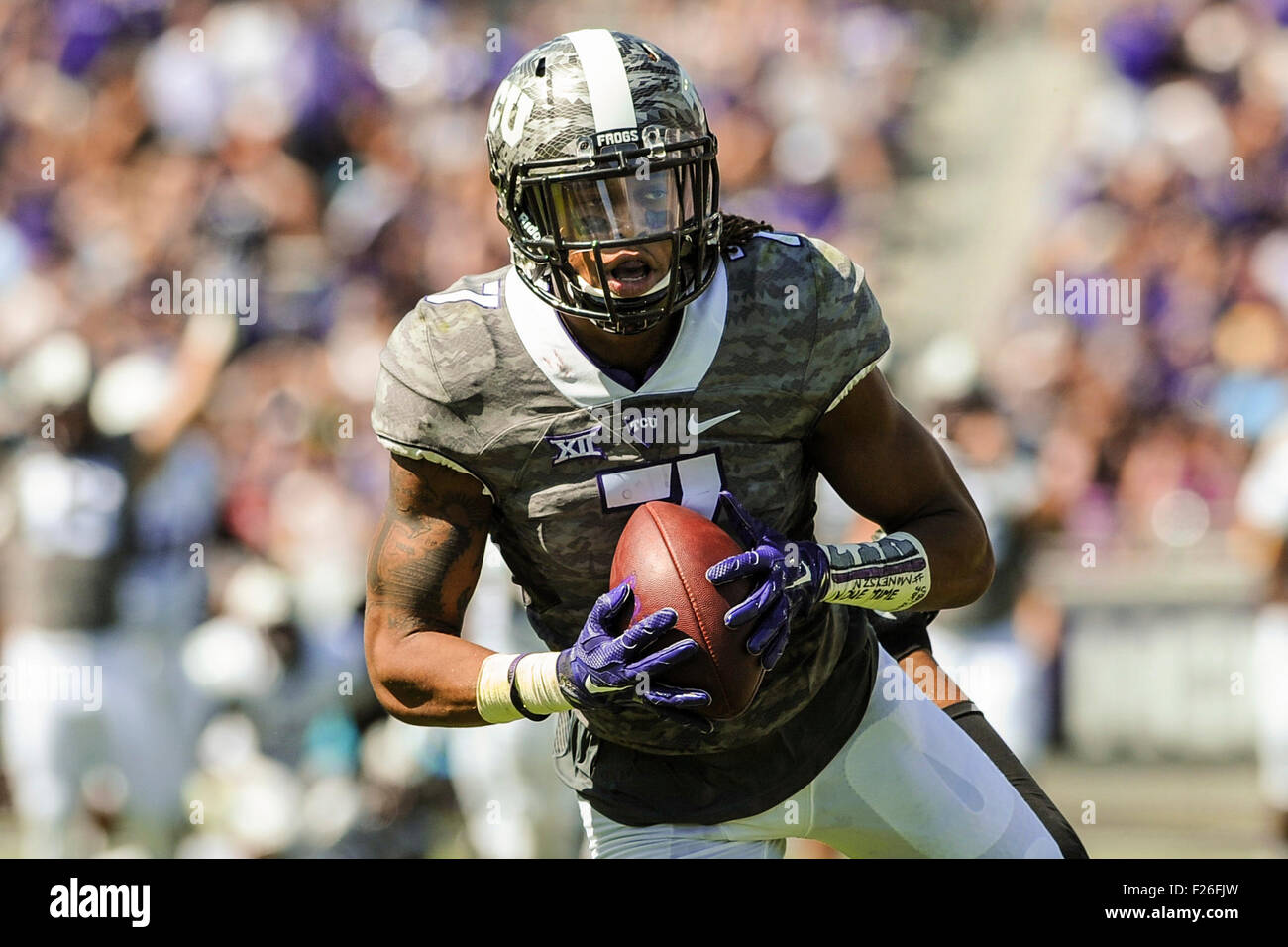 TCU receiver Kolby Listenbee (7) catches a 60 yard pass for a touchdown ...