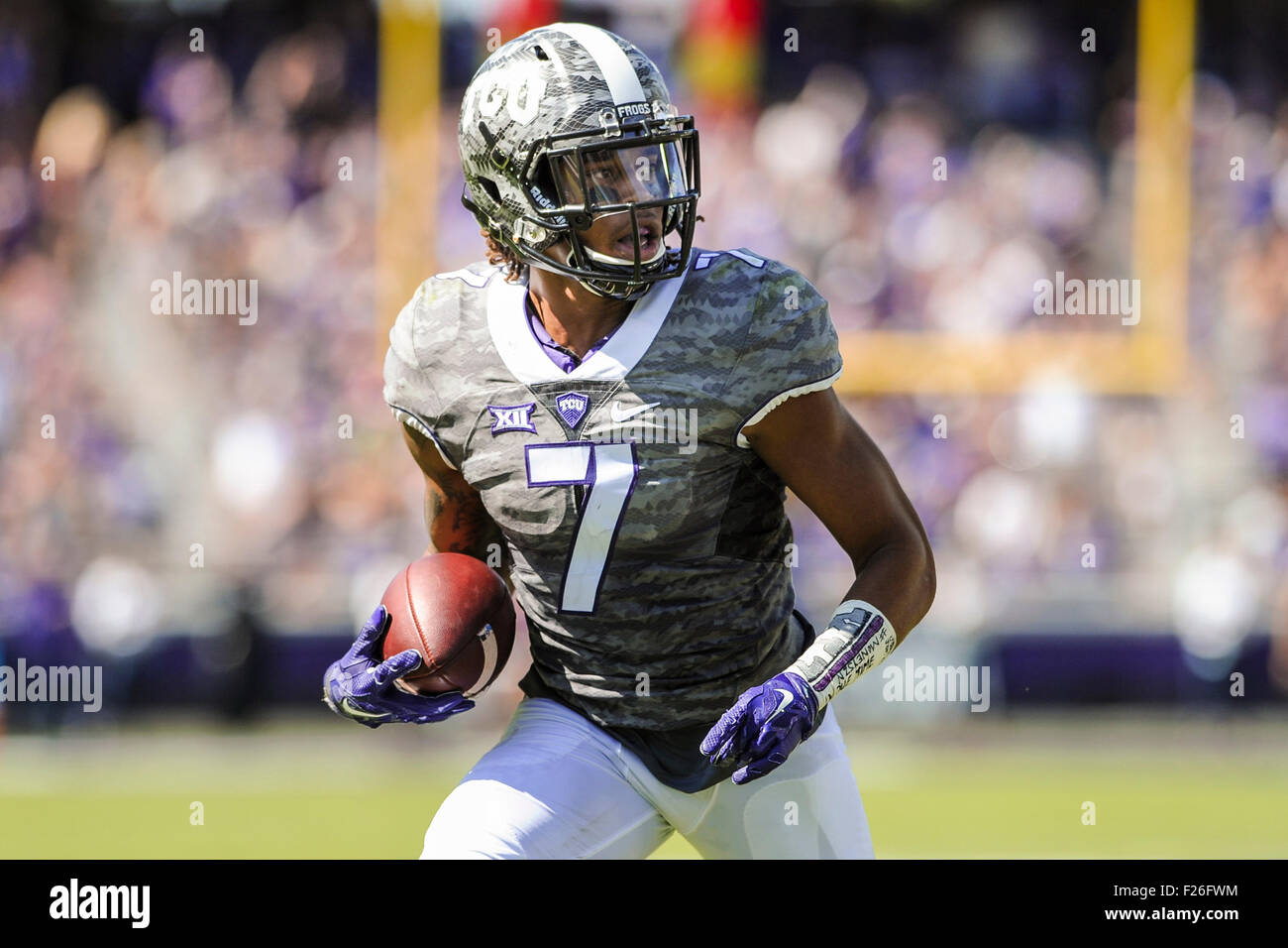 TCU receiver Kolby Listenbee (7) catches a 60 yard pass for a touchdown ...