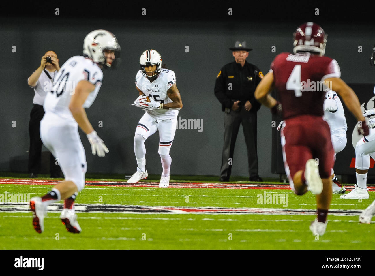 Max Morrison (25) of the Cincinnati Bearcats receives the first kickoff ...