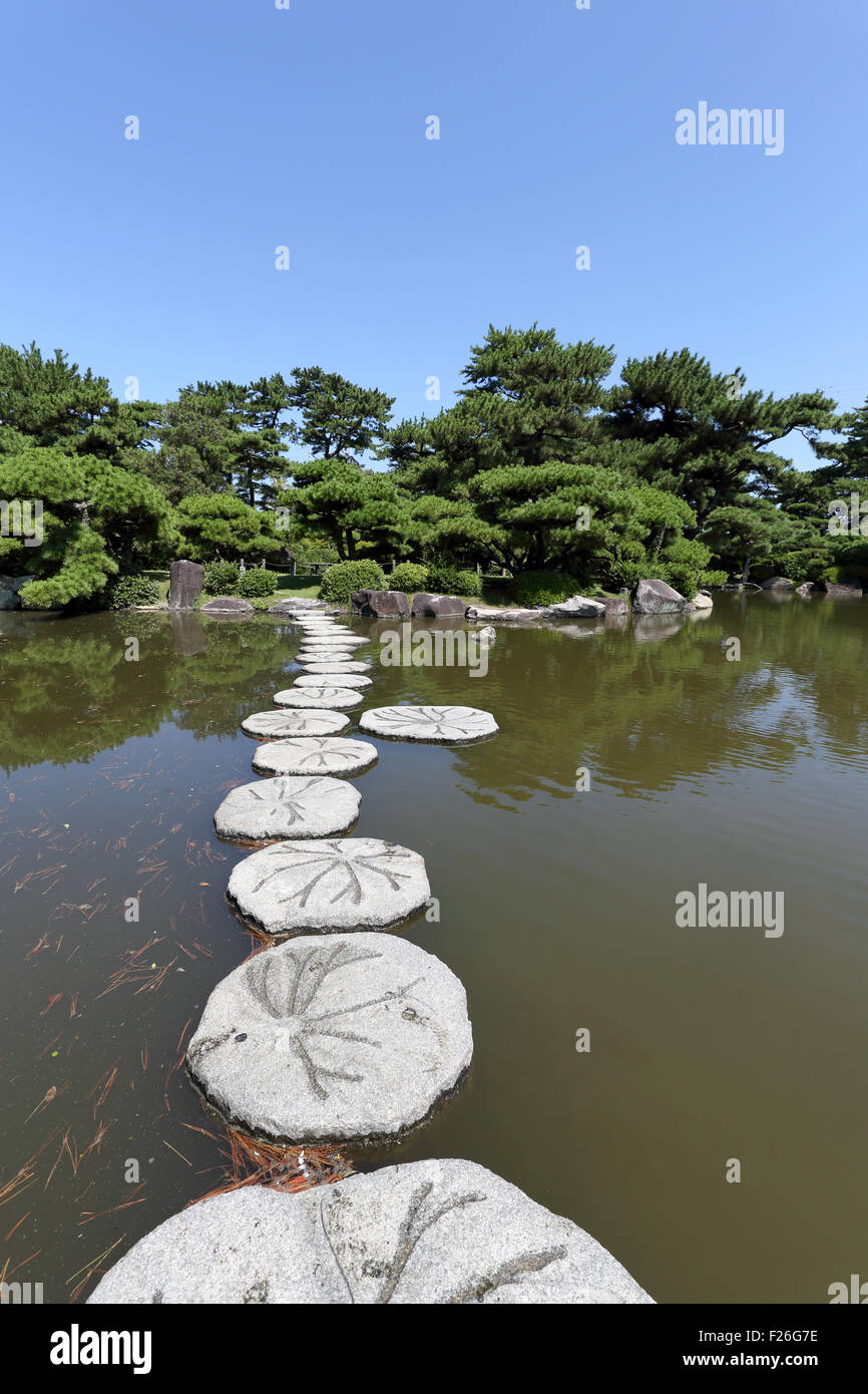 Stone path in water Japanese garden Stock Photo - Alamy
