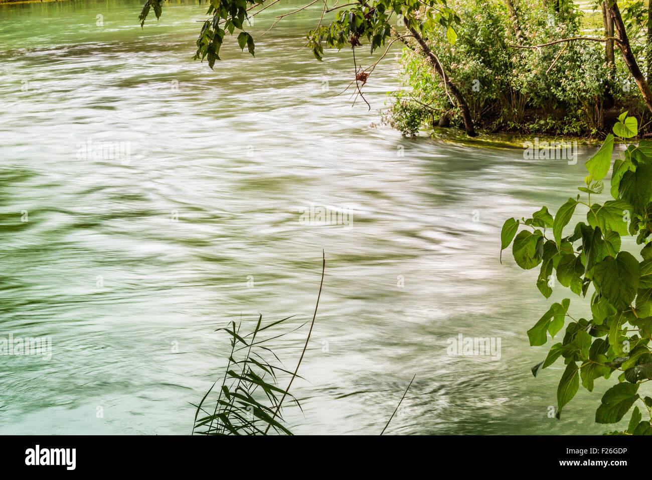 River waters flowing in the Italian countryside at the sunset Stock ...