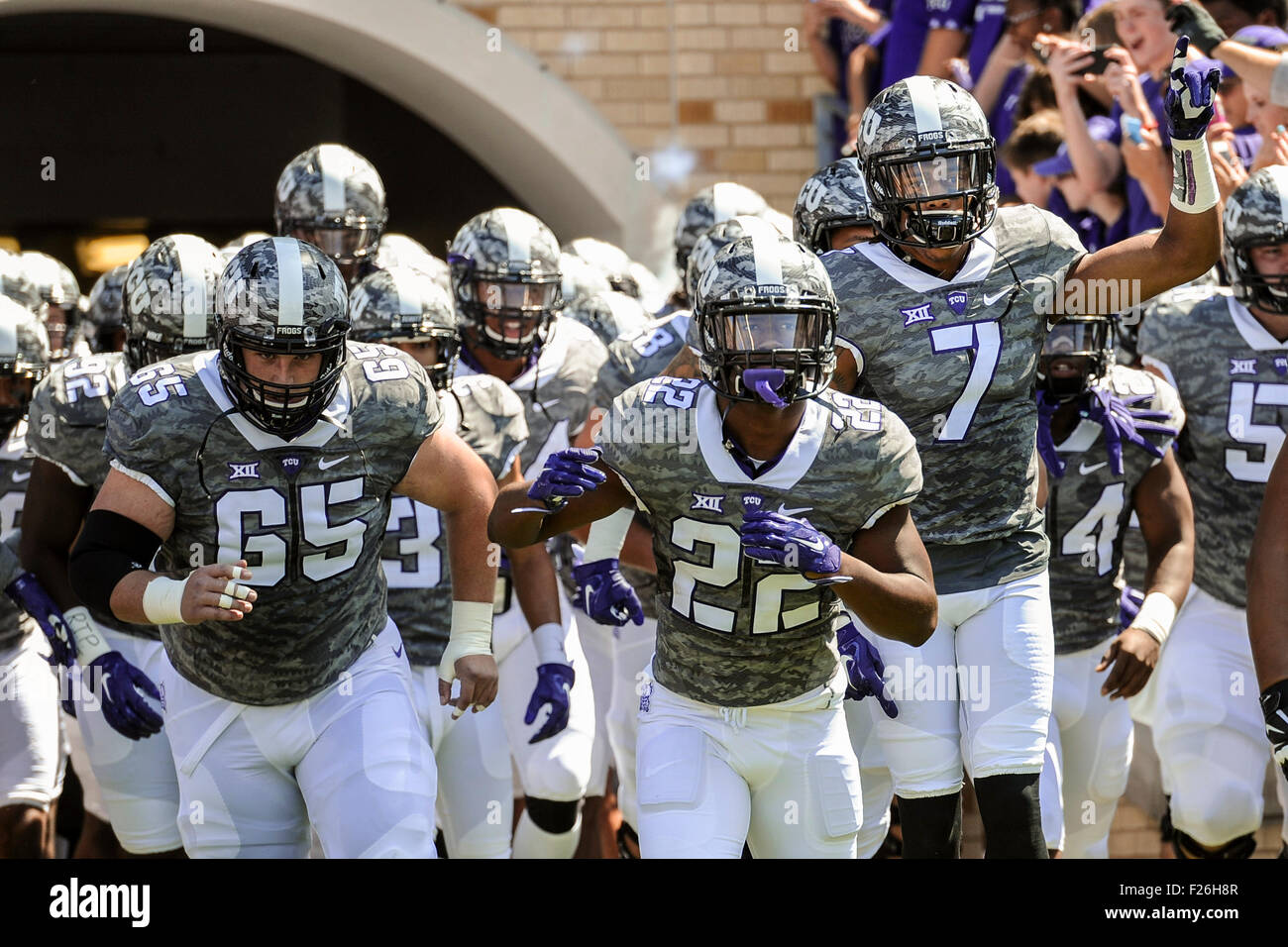 TCU offensive guard Brady Foltz (65), running back Aaron Green (22 ...