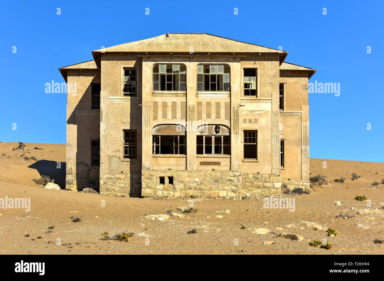The abandoned ghost diamond town of Kolmanskop in Namibia, which is ...