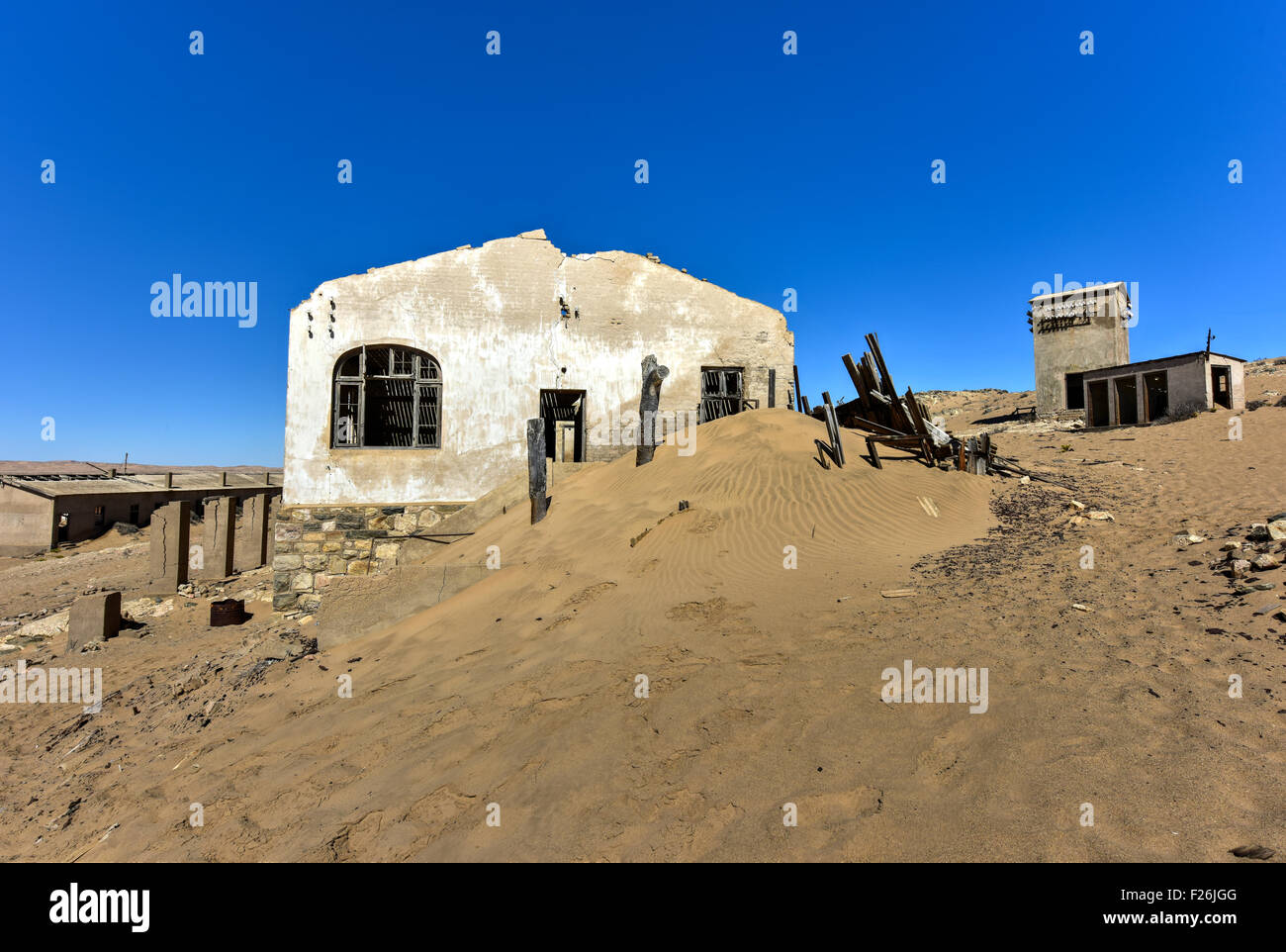 The abandoned ghost diamond town of Kolmanskop in Namibia, which is ...