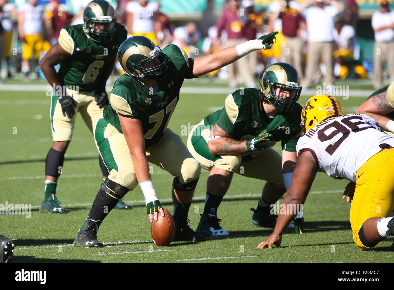 Ot. 12th Sep, 2015. Colorado State center Jake Bennett gives the line ...