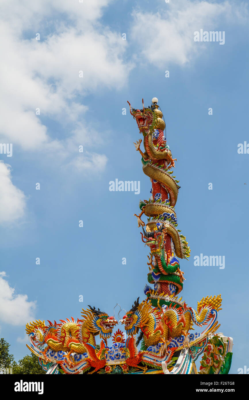 dragons statue two towers in the sky Stock Photo - Alamy
