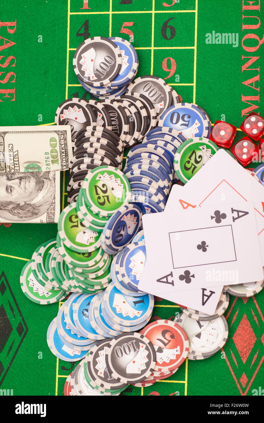Poker chips, money,playing cards and dice Stock Photo - Alamy