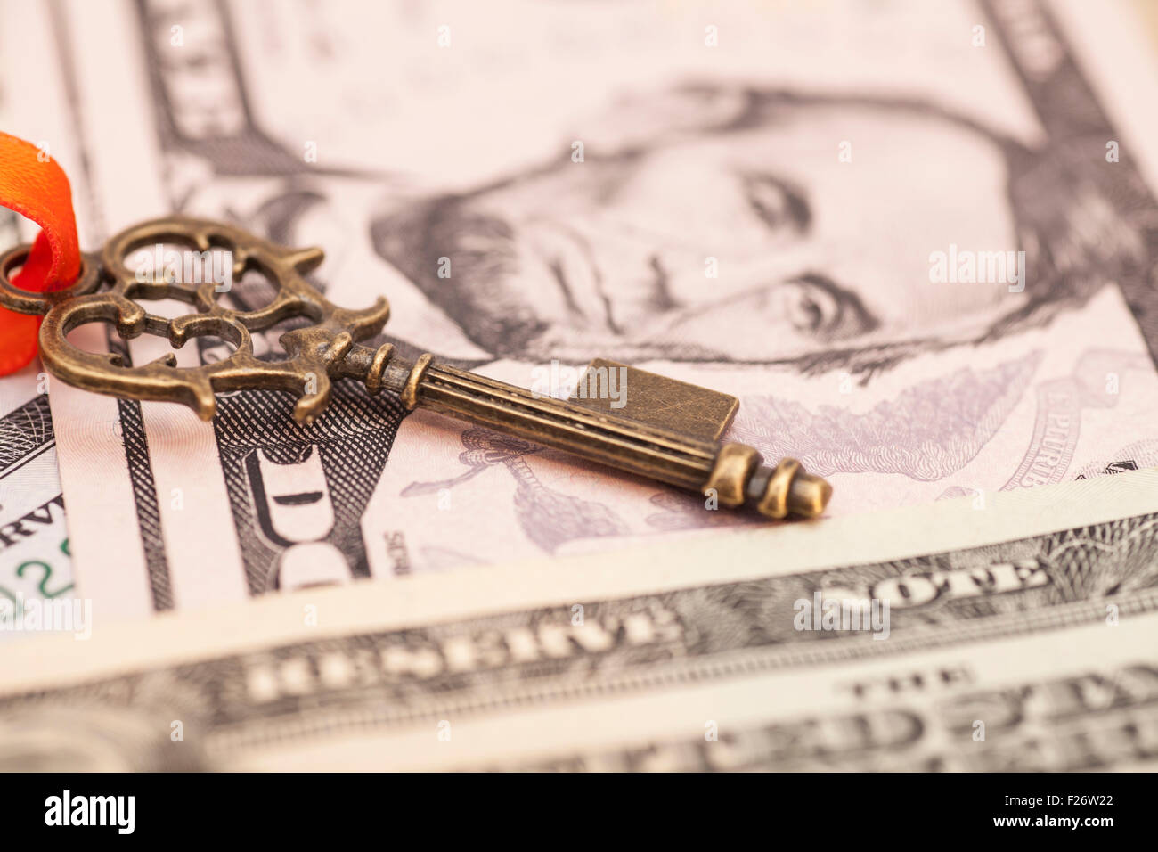 Key to success on dollar banknotes Stock Photo - Alamy