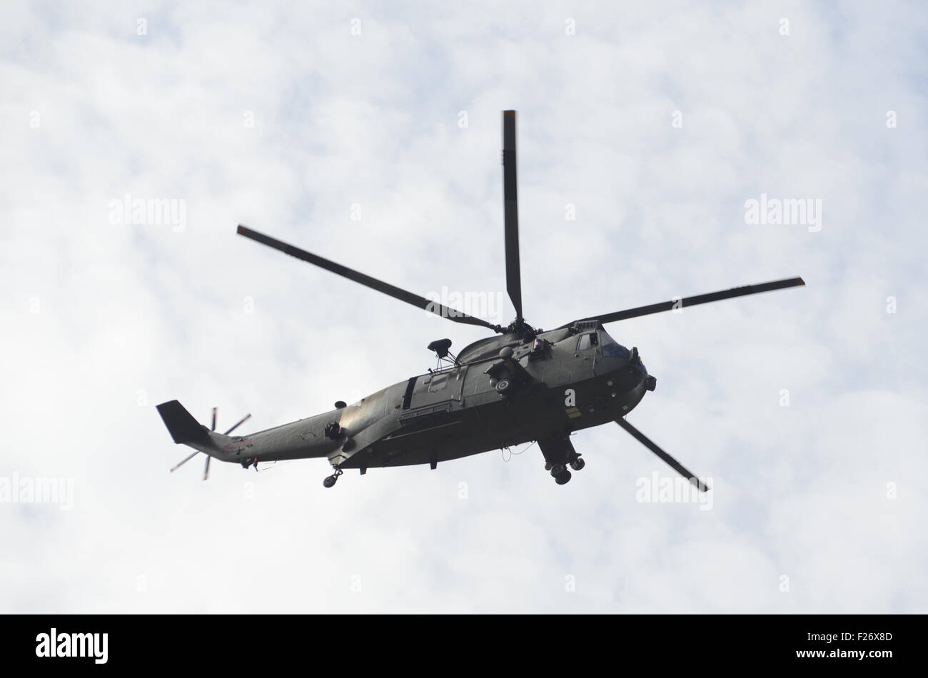 London, UK, 11/09/2015, Royal Navy helicopter over the Thames in London ...