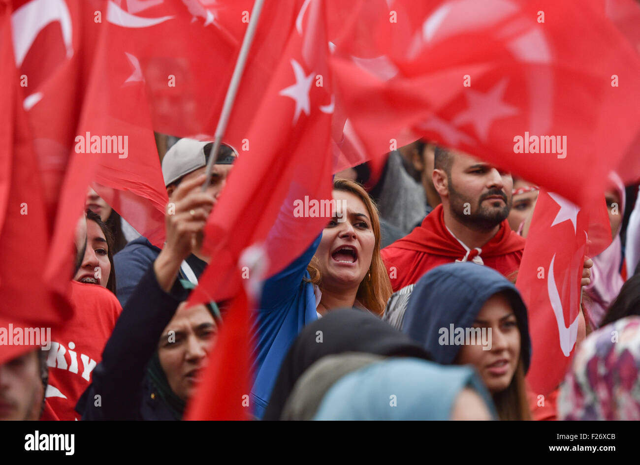 Mannheim, Germany. 12th Sep, 2015. People wave Turkish flags during a ...