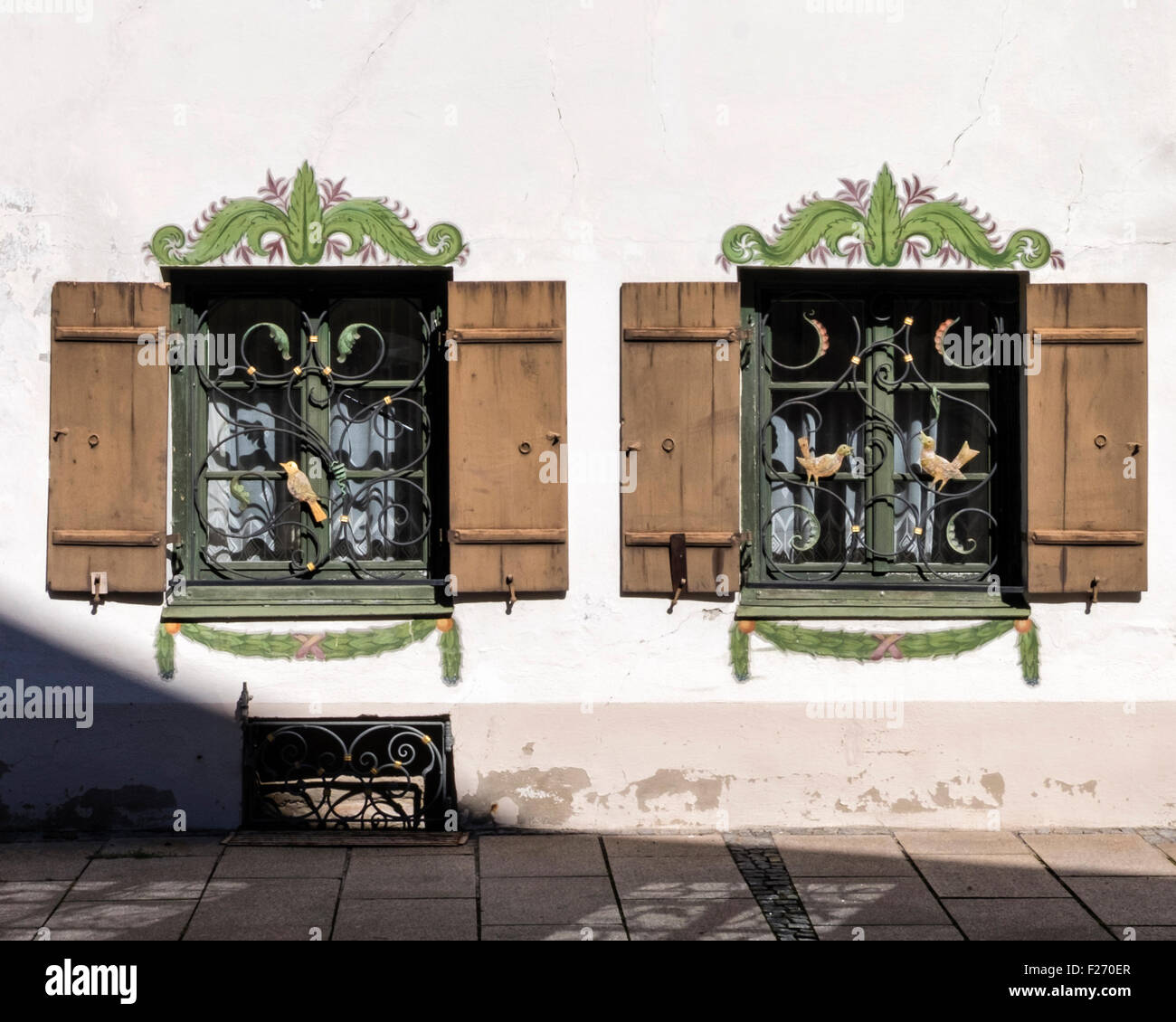 Bavarian building detail, Shuttered windows and decorative paintwork ...