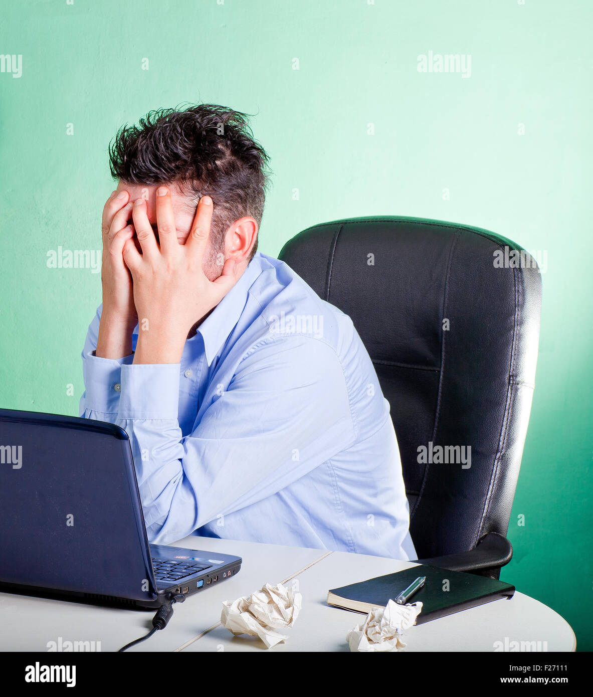 Frustrated and desperate businessman in his office Stock Photo - Alamy