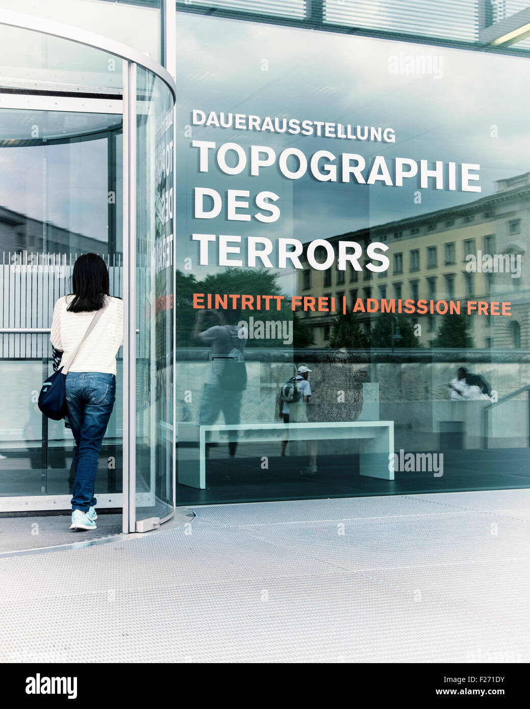 Woman enters Berlin Topography of Terror indoor and outdoor museum ...