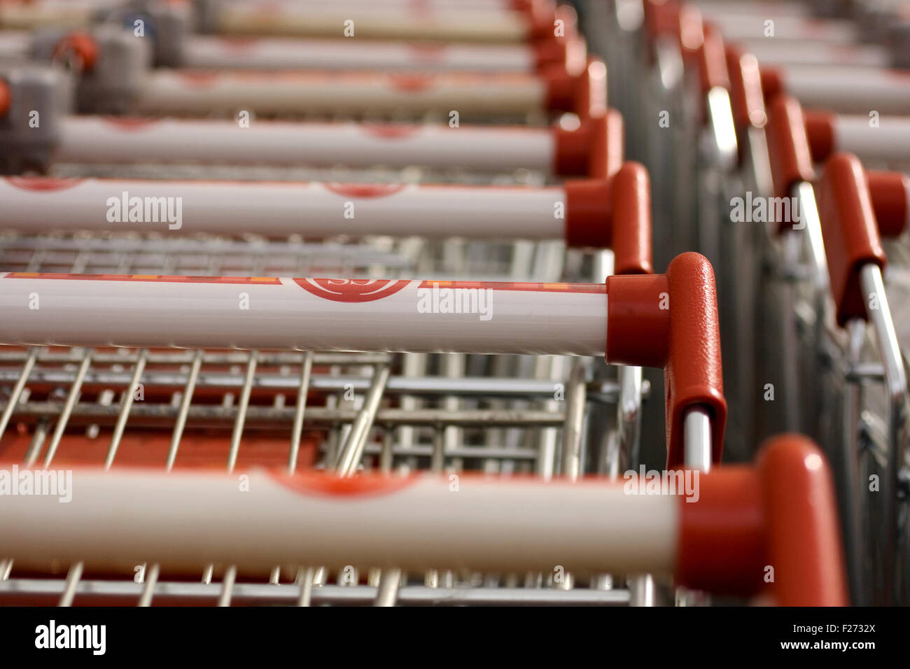 A series of shopping carts in a row Stock Photo - Alamy