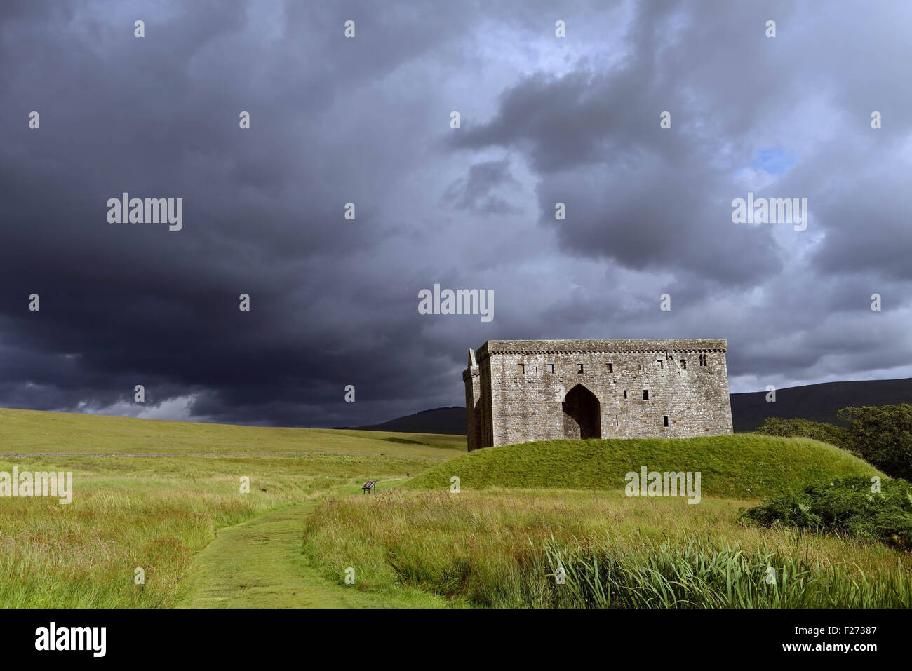 MOODY SKIES OVER HERMITAGE CASTLE, NEAR NEWCASTLETON, THE SCOTTISH ...