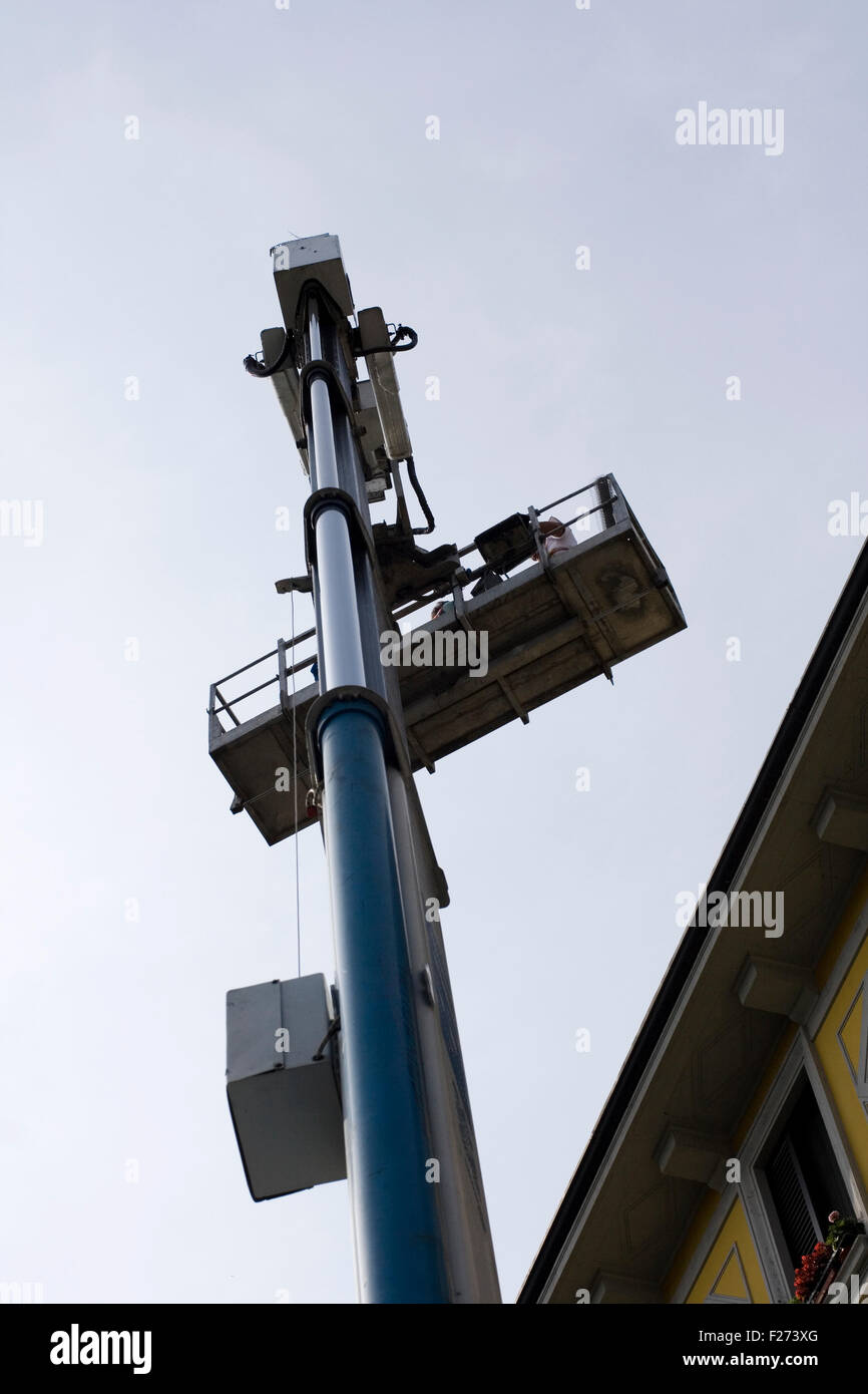 Crane working in a building Stock Photo - Alamy