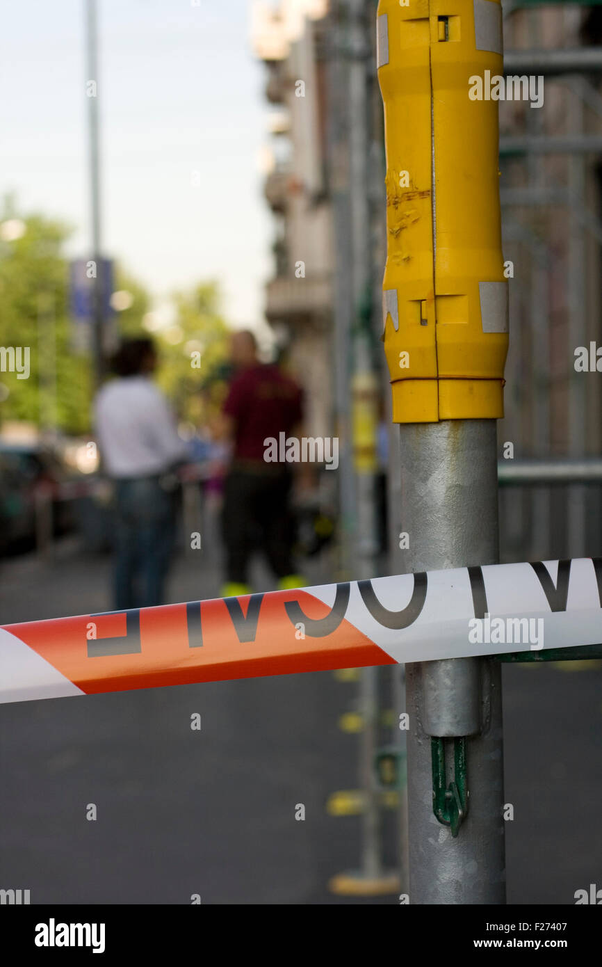 Red ribbon and white in a construction site Stock Photo - Alamy