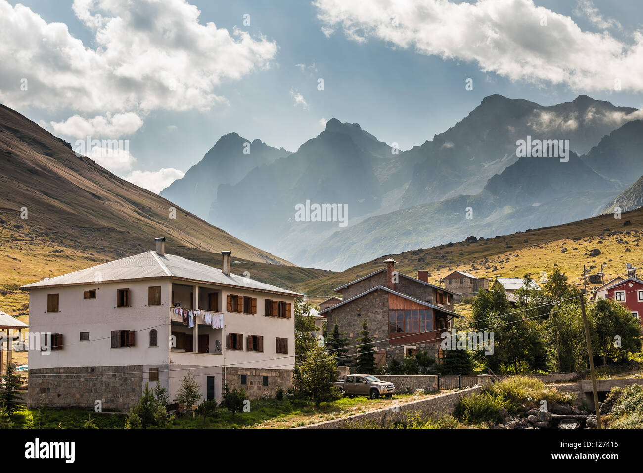 Mountain houses with clouds in Ayder Plateau, Rize, Turkey Stock Photo ...
