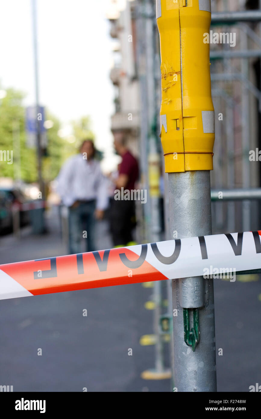 Red ribbon and white in a construction site Stock Photo - Alamy