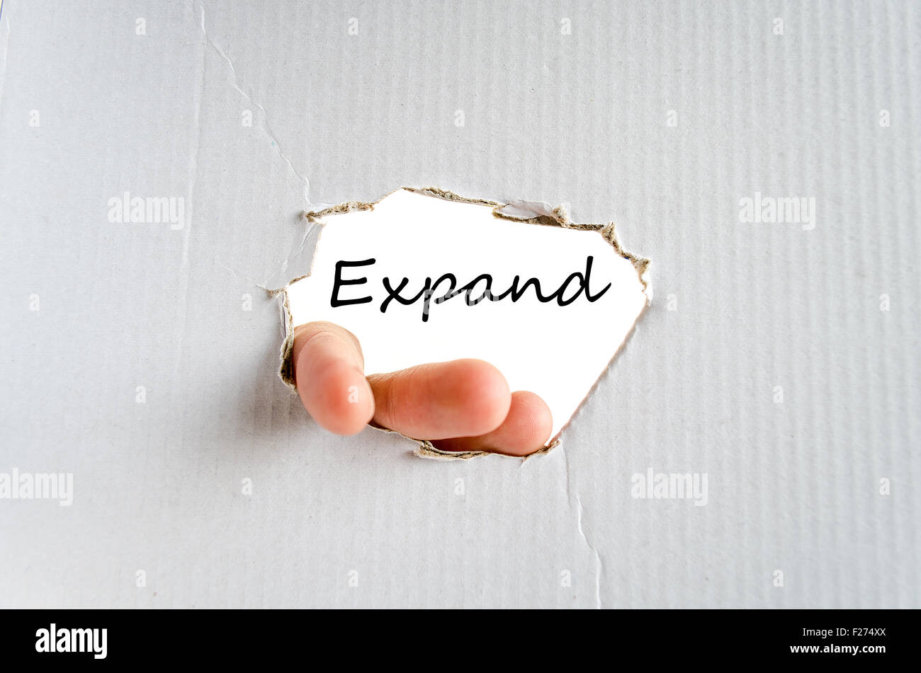 Expand text concept isolated over white background Stock Photo - Alamy