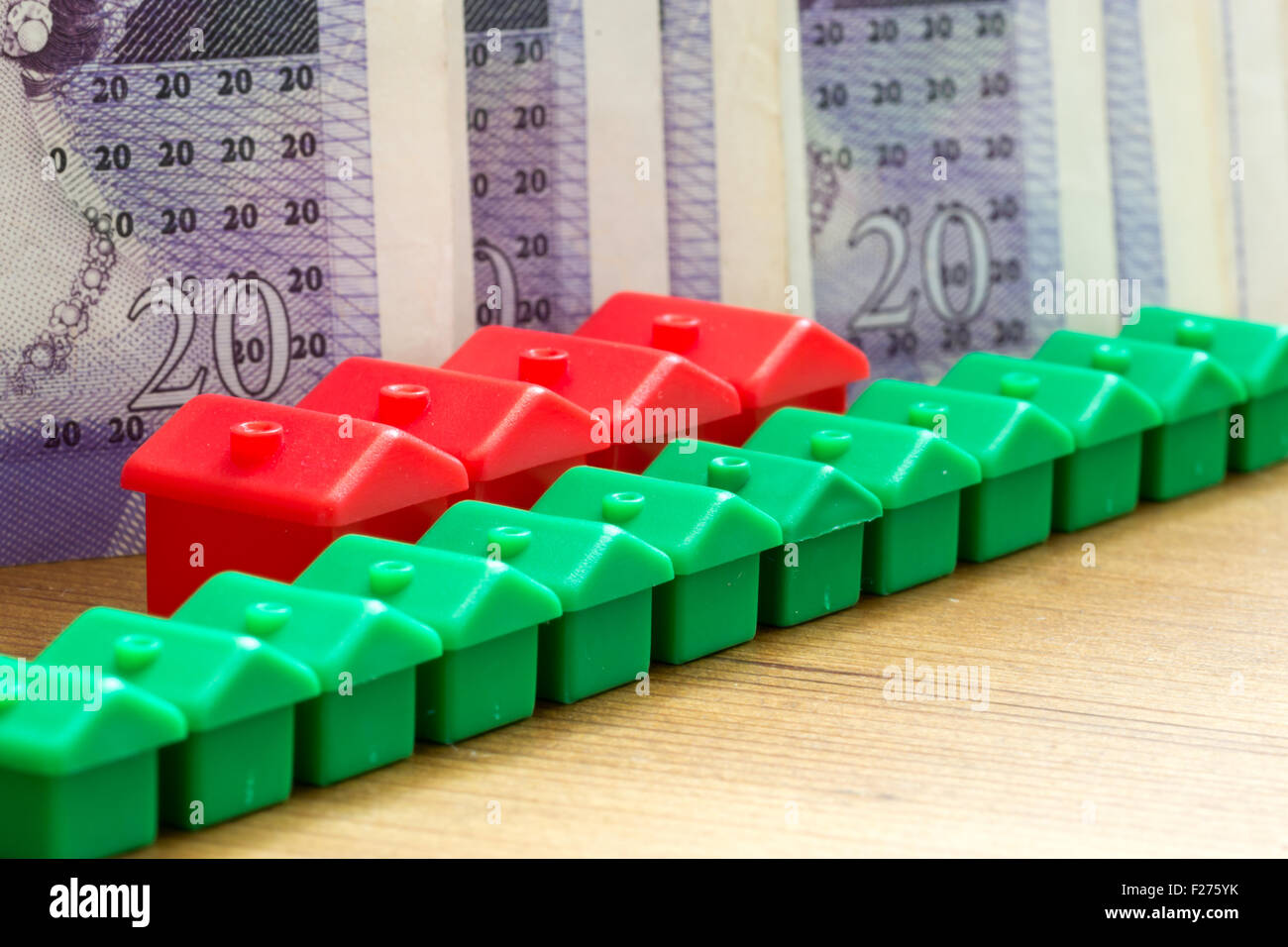 House and pound notes hi-res stock photography and images - Alamy