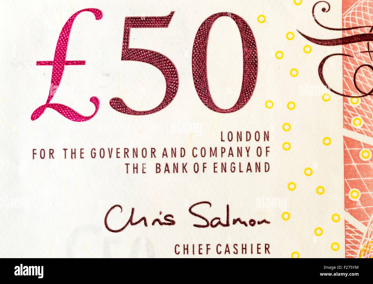 Macro close up of a single British fifty pound note showing the Bank of ...