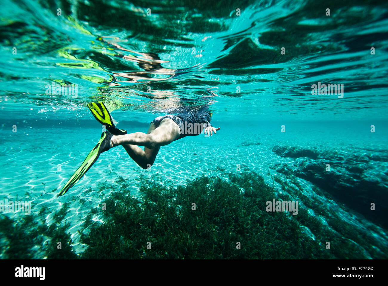 Bikini clad woman hi-res stock photography and images - Alamy