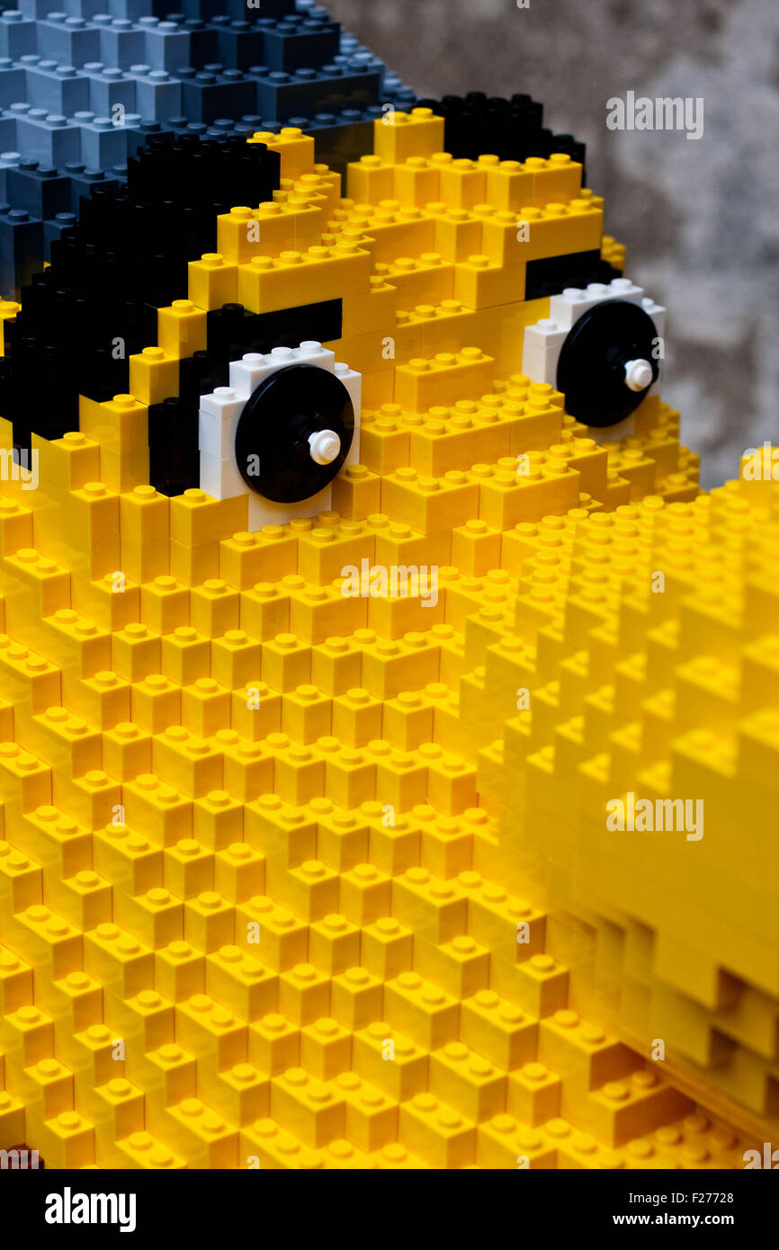 Face maked with yellow plastic toy bricks Stock Photo - Alamy