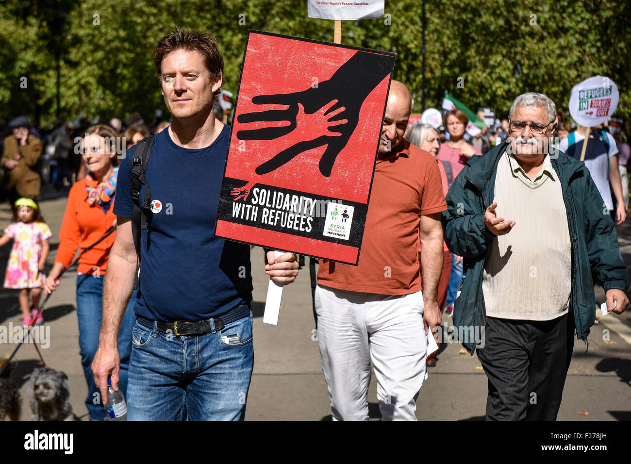 A demonstration in support of refugees and migrants in London Stock ...